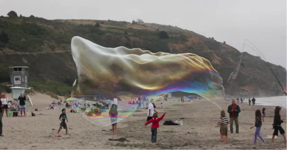 A Man Took a Giant Bubble Maker to a Beach. Here are the Results